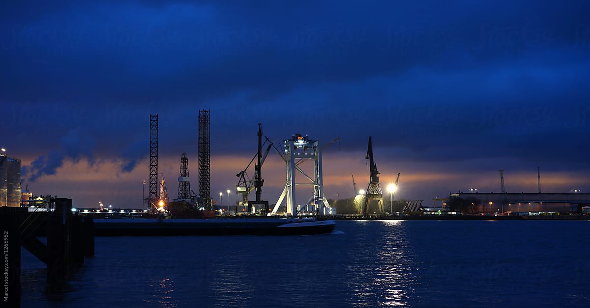 "Port Of Rotterdam At Night" by Stocksy Contributor "Marcel" - Stocksy