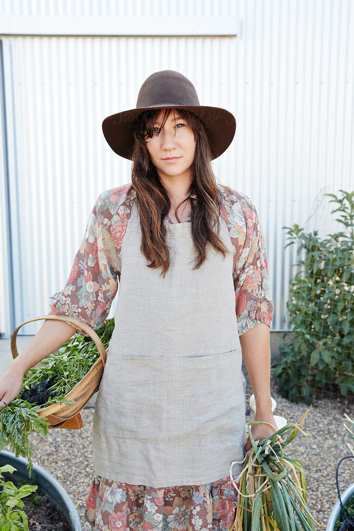"Woman Gardening In Her Backyard Vegetable Garden" by Stocksy ...