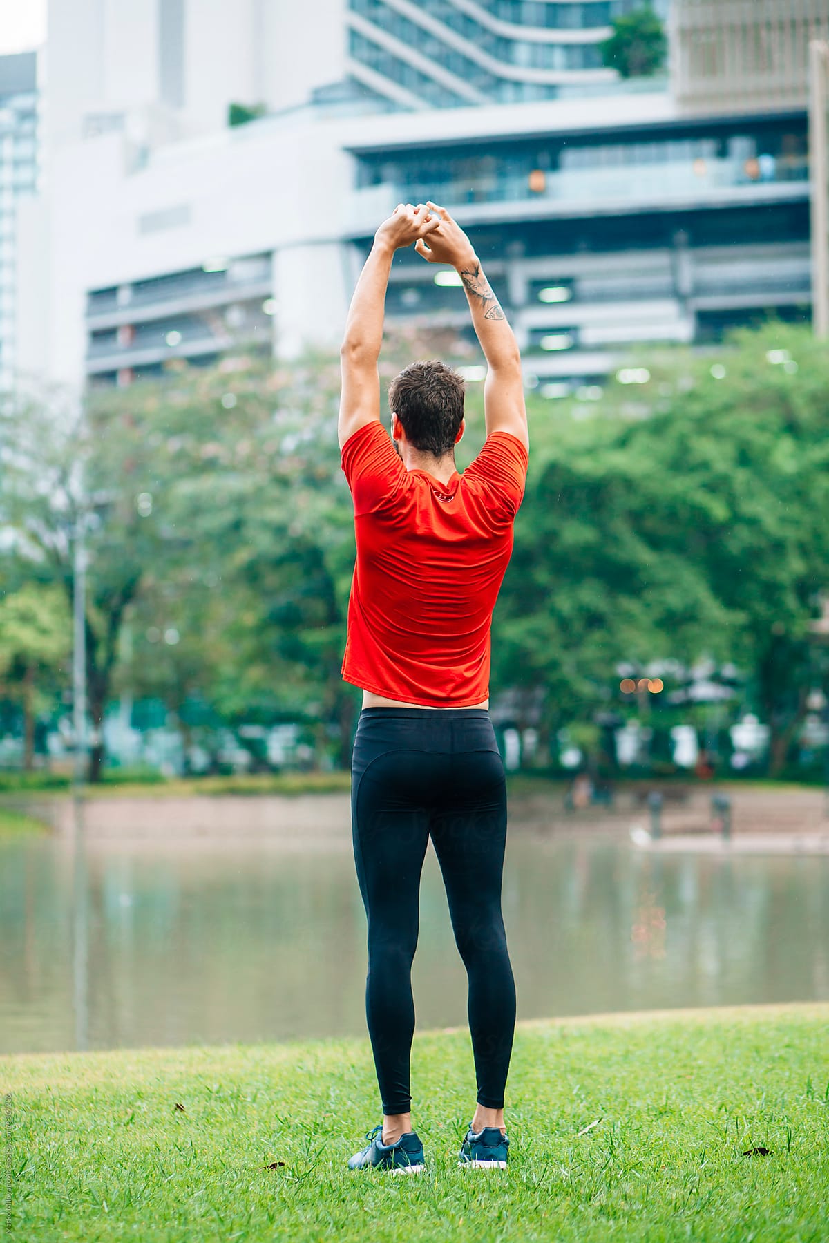 "Back Portrait Of A Man Stretching" by Stocksy Contributor "Marko ...