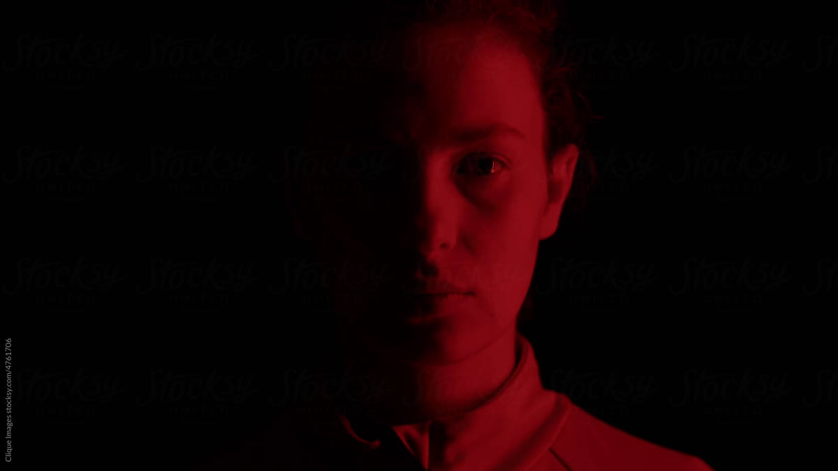 "Woman With Red Neon Light Illuminating Face" by Stocksy Contributor ...