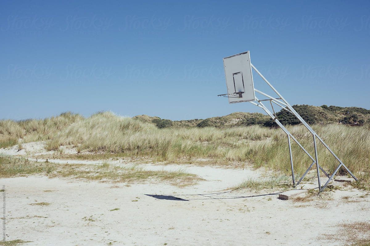 "Basketball Hoop On A Desert Beach" by Stocksy Contributor "Robert ...