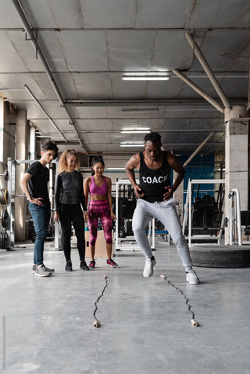 "Trainer Demonstrating Exercise To Athletes" by Stocksy Contributor ...