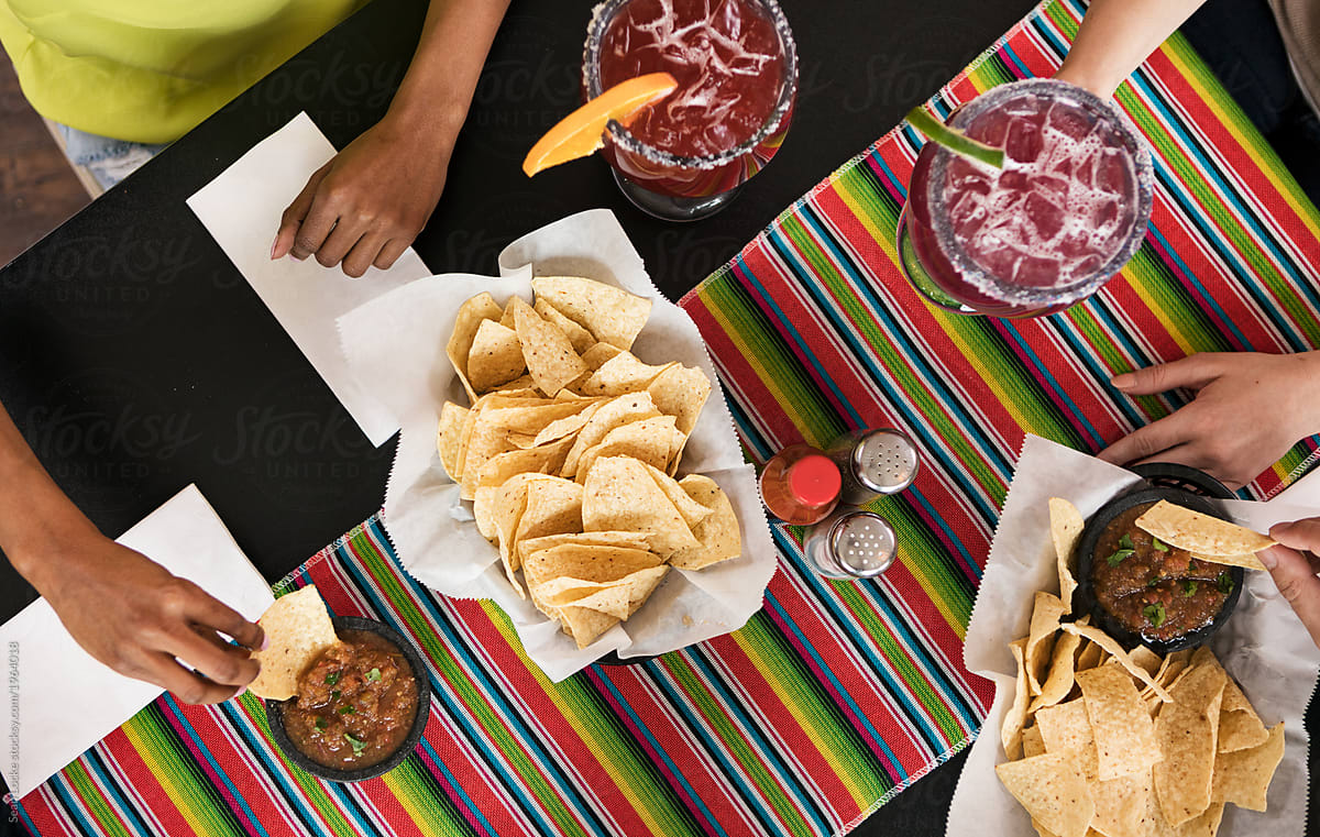 "Cinco: Overhead View Of Anonymous Friends Eating Chips And Salsa" by ...
