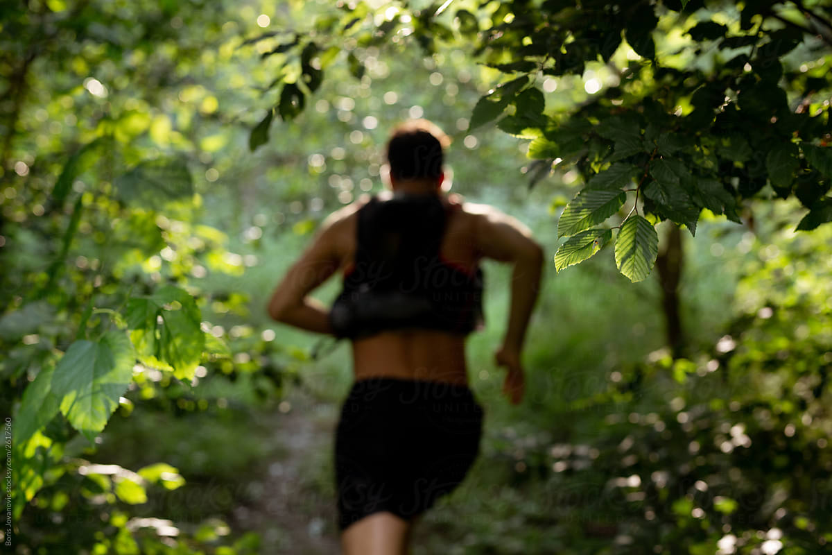 "A Runner In The Nature" by Stocksy Contributor "Boris Jovanovic" - Stocksy