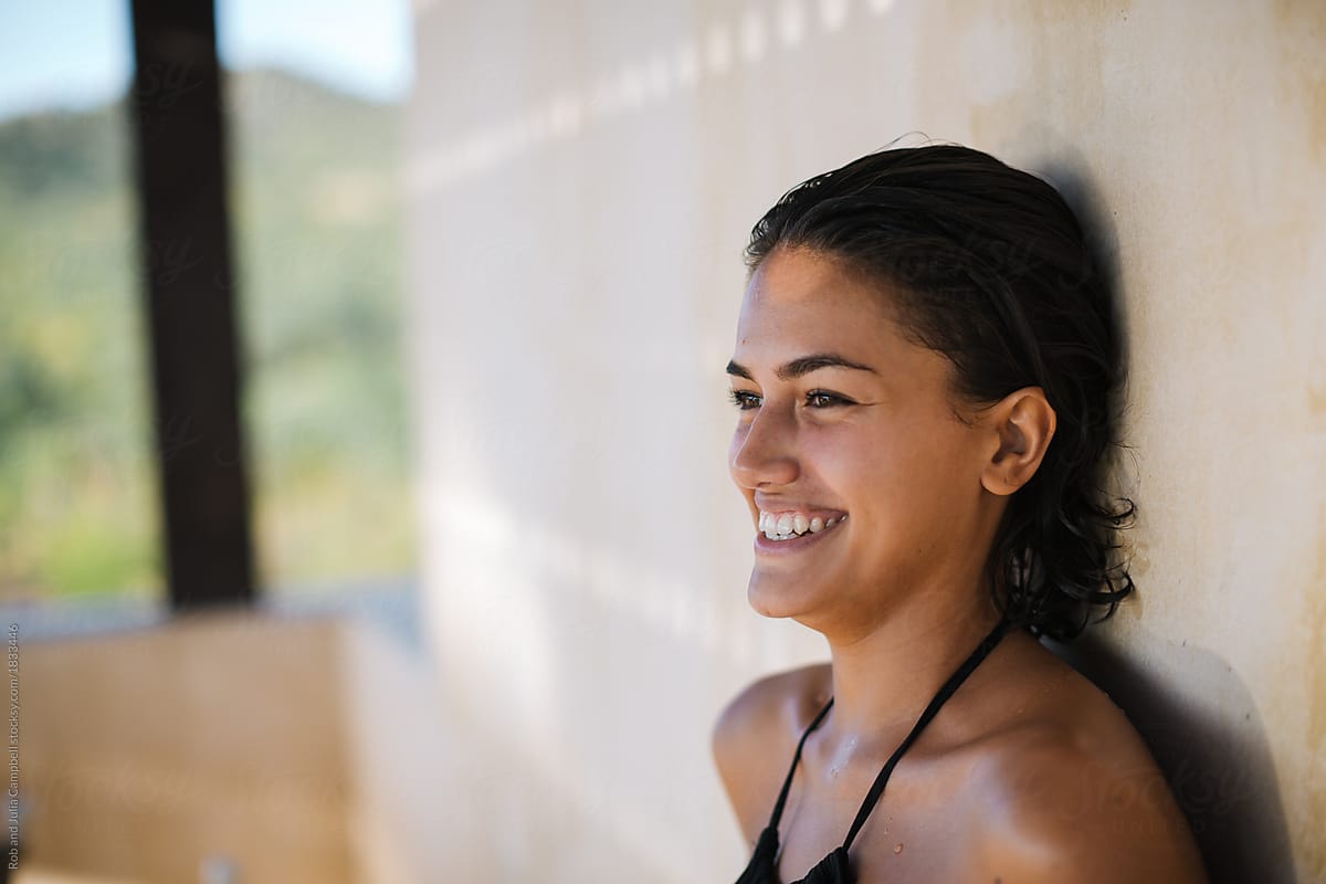 "Happy Young Woman Enjoying Pool On Sunny Day" by Stocksy Contributor ...