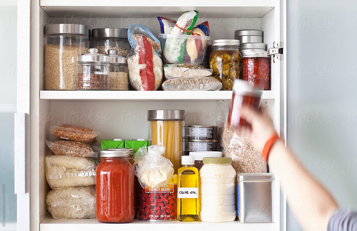 "Stocked Kitchen Pantry" by Stocksy Contributor "Jill Chen" - Stocksy