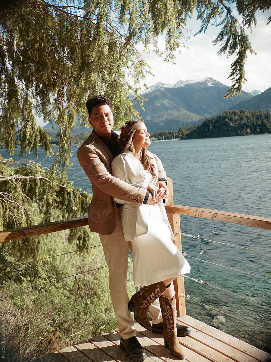 "Portrait Of Newlywed Couple At Lake House" by Stocksy Contributor ...