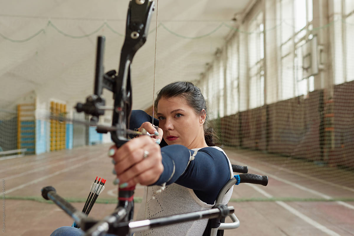 "Disabled Female Archer Shooting" by Stocksy Contributor "Clique Images ...