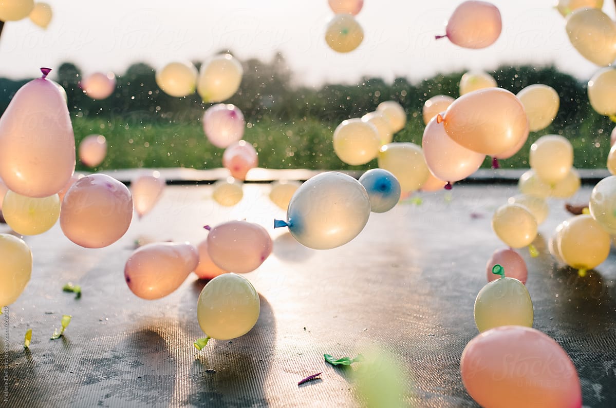 "Water Balloons" by Stocksy Contributor "Melanie DeFazio" - Stocksy