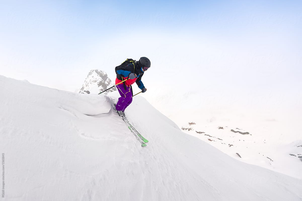 "Male Skier Freeriding Off Piste Through Powdery Snow" by Stocksy ...