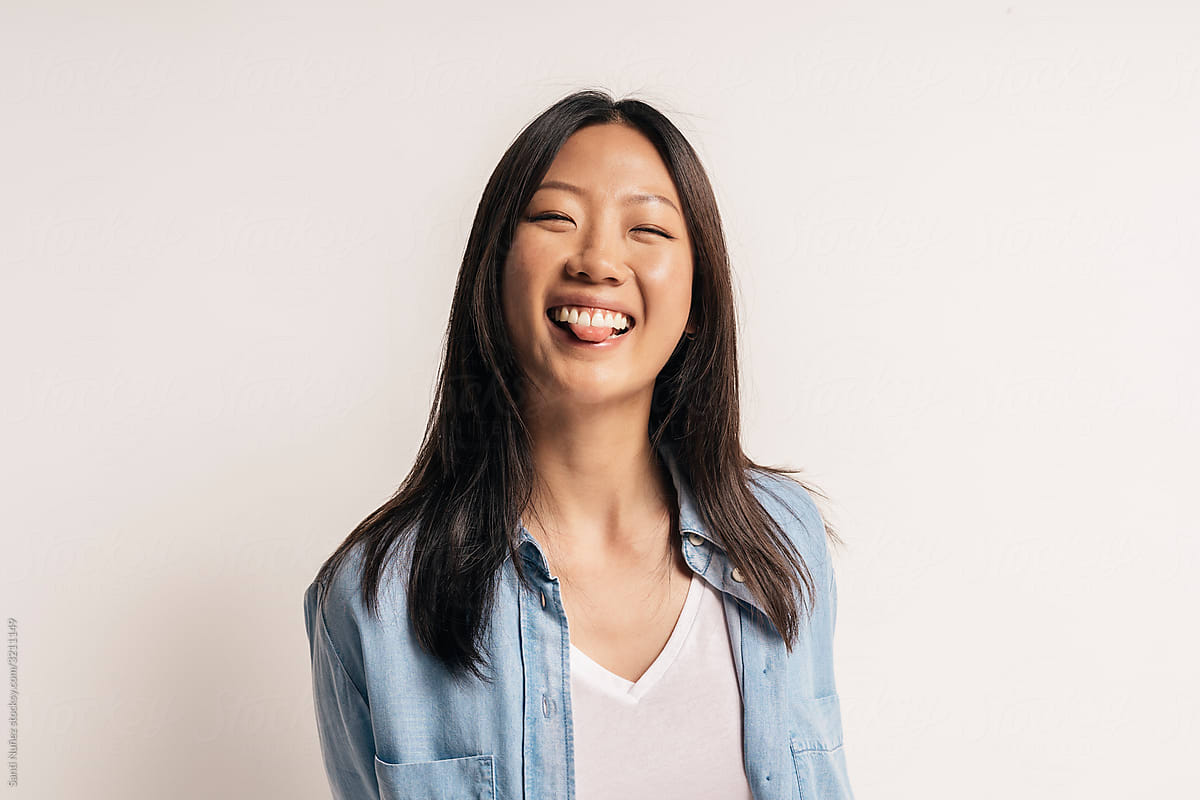 "Portrait Of Smiley Asian Woman" by Stocksy Contributor "Santi Nuñez ...
