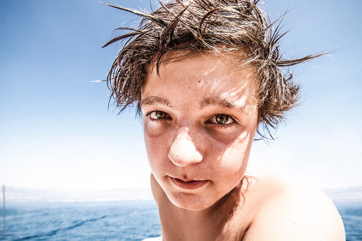 "Wideangle Portrait Of A Young, Freckle-faced Boy" by Stocksy ...