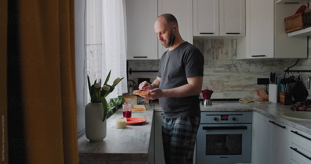 "Man Dancing And Cooking Breakfast In Kitchen" by Stocksy Contributor ...
