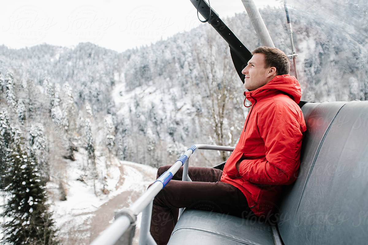"Content Man On Chairlift In Motion" by Stocksy Contributor "Alina ...