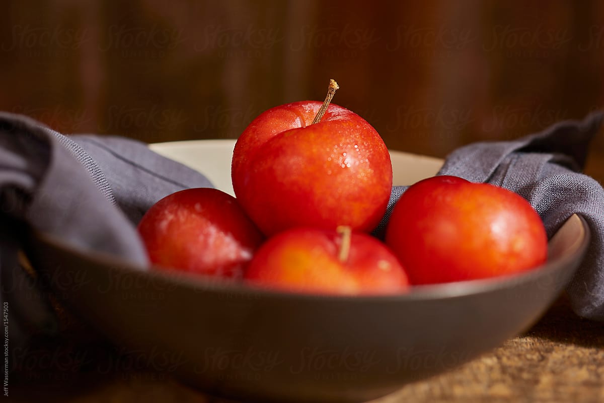 "Sweet Red Plums" by Stocksy Contributor "Jeff Wasserman" - Stocksy