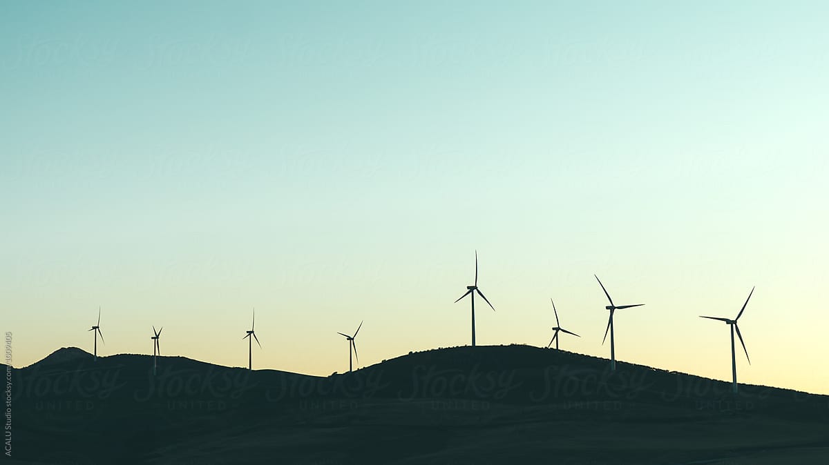 "Group Of Windmills At Sunset" by Stocksy Contributor "ACALU Studio ...