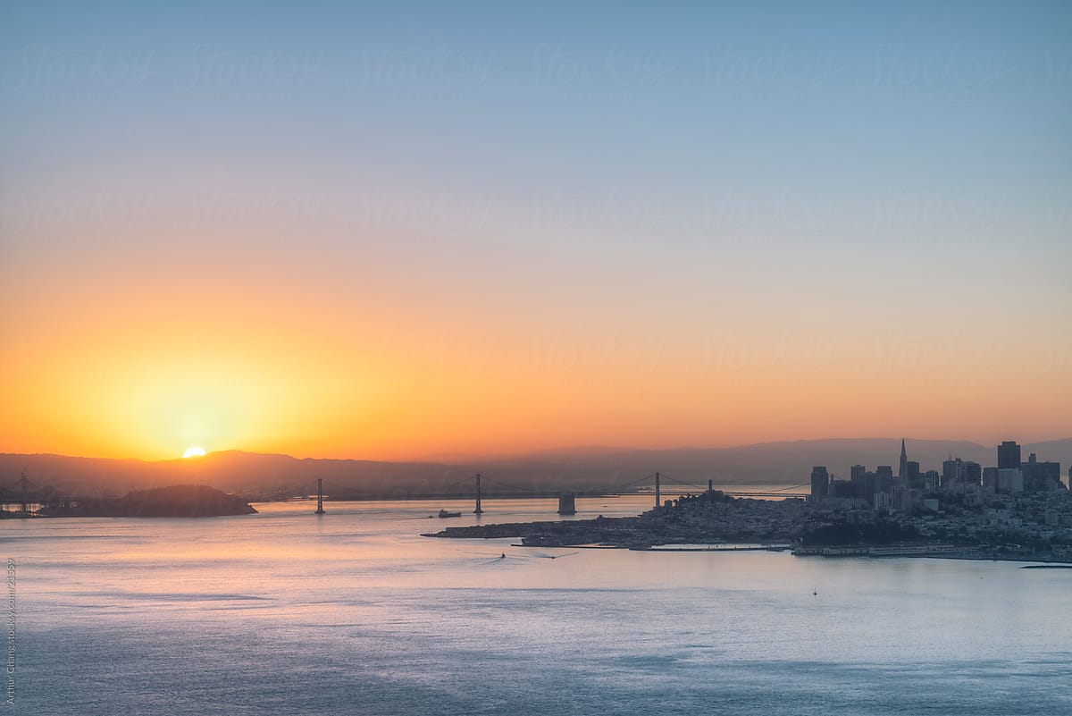 "Sunrise Over The Bridge" by Stocksy Contributor "Arthur Chang" - Stocksy