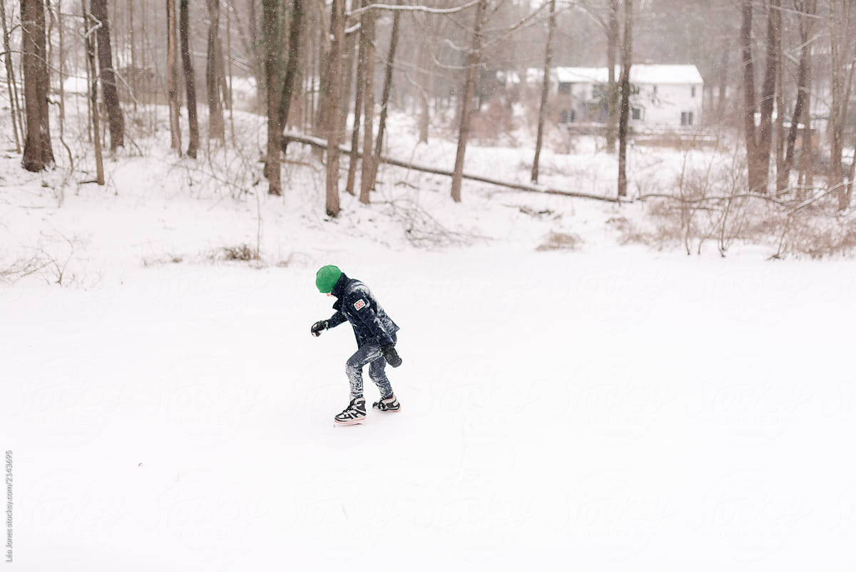 "Little Boy Skating On A Pond On A Snowy Day" by Stocksy Contributor ...