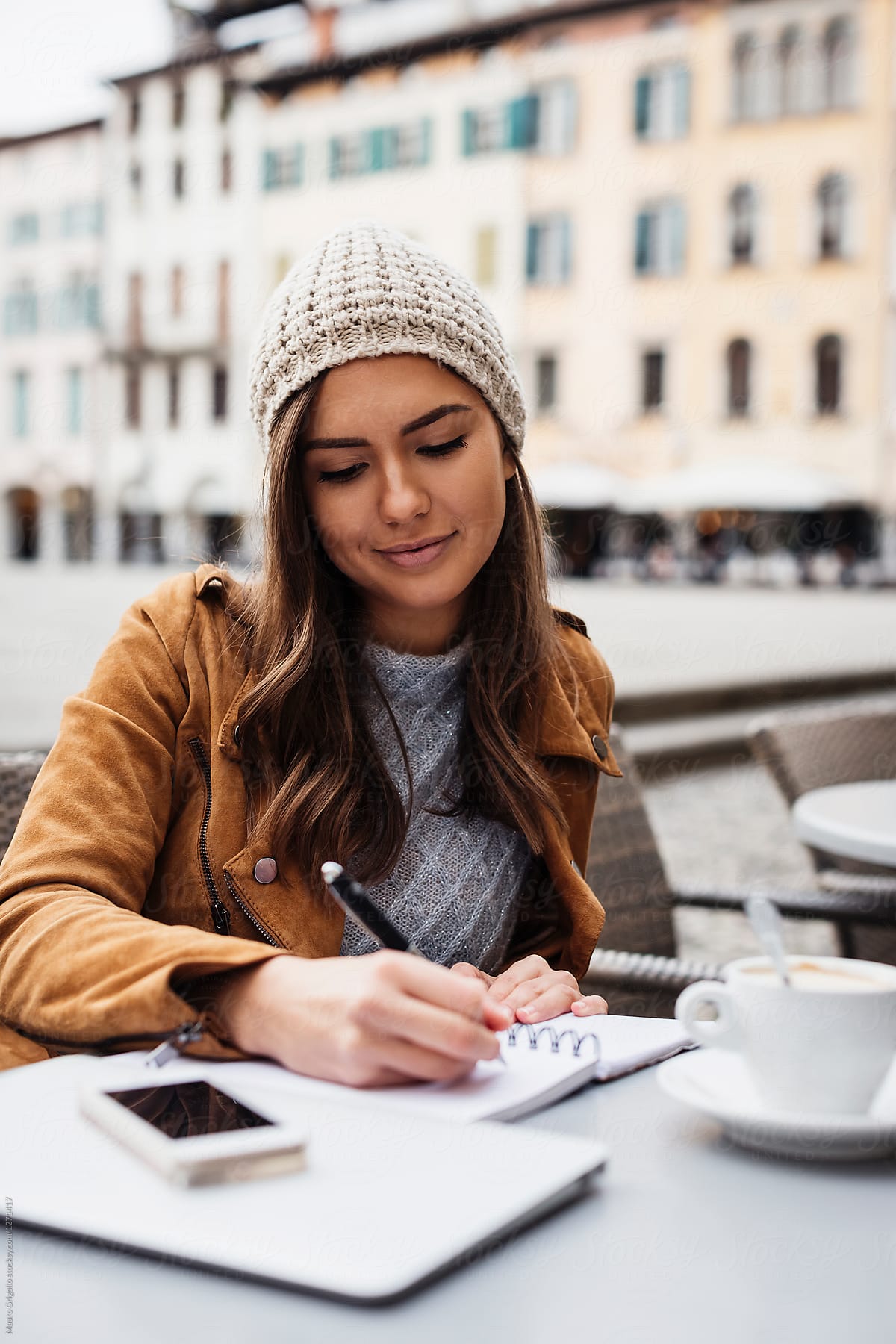 Woman Student Writing Notes On Her Copybook At The Bar Del