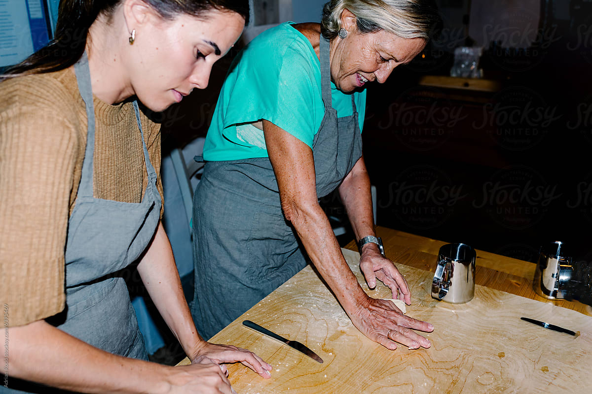 "Mother And Daughter Preparing Dough To Cook Fresh Pasta" by Stocksy ...