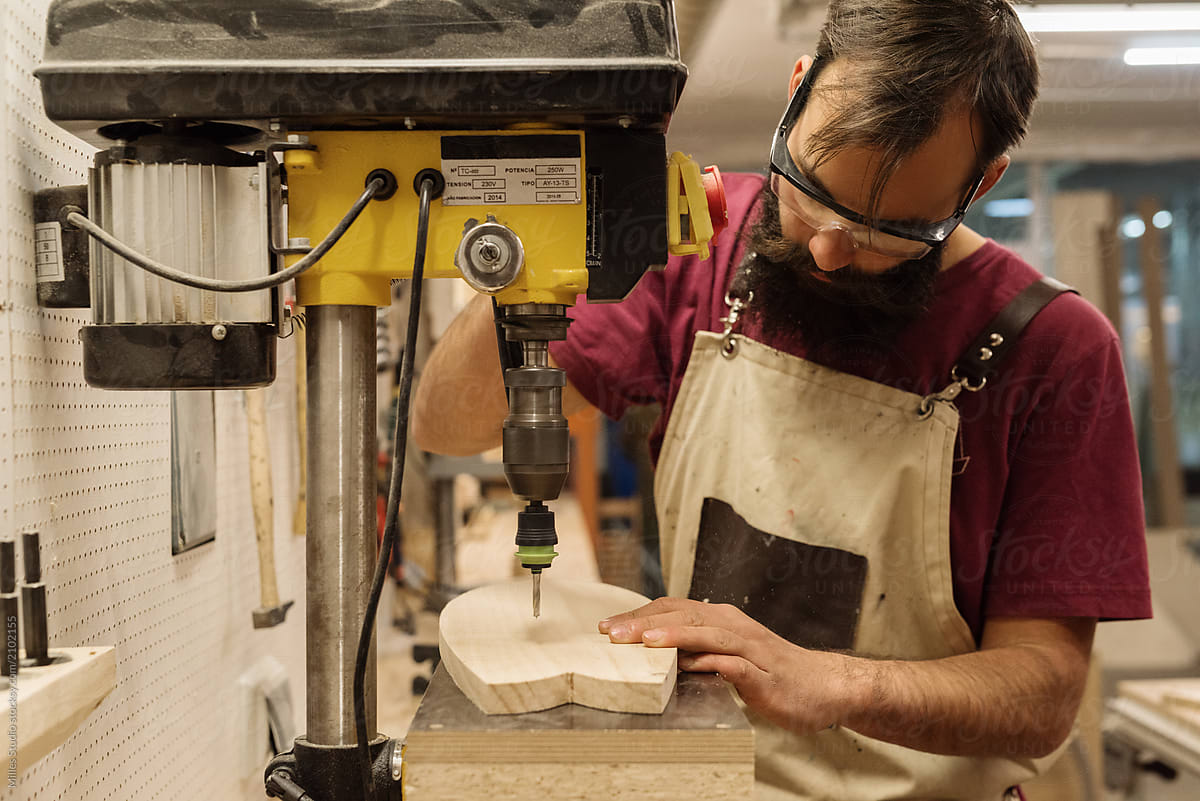 "Craftsman Working With Drilling Machine" by Stocksy Contributor ...