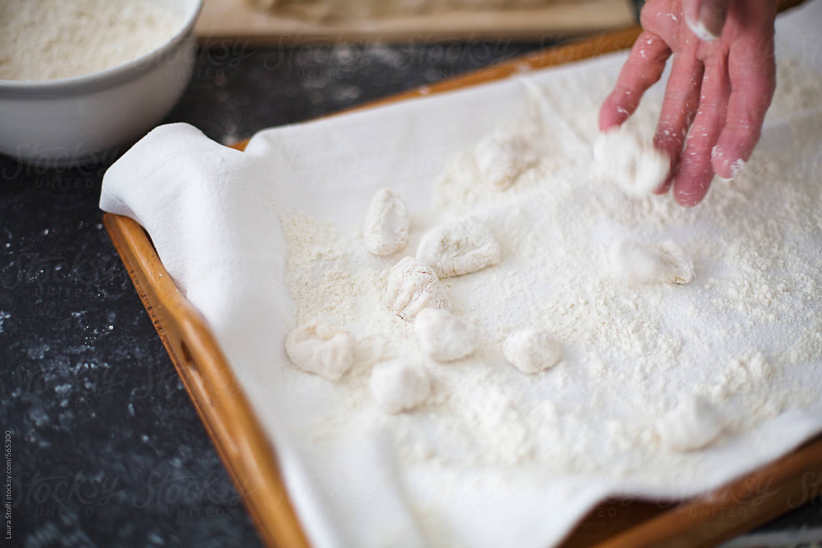 "Hand Collecting Handmade Potato Gnocchi On Covered With Flour Tray" by ...
