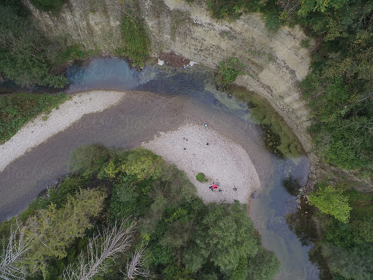 "Aerial View Of River Curve." by Stocksy Contributor "Rolfo" - Stocksy