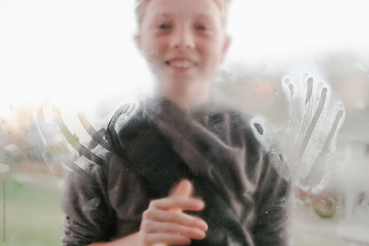 "Child's Handprints On Window" by Stocksy Contributor "Maryanne Gobble ...