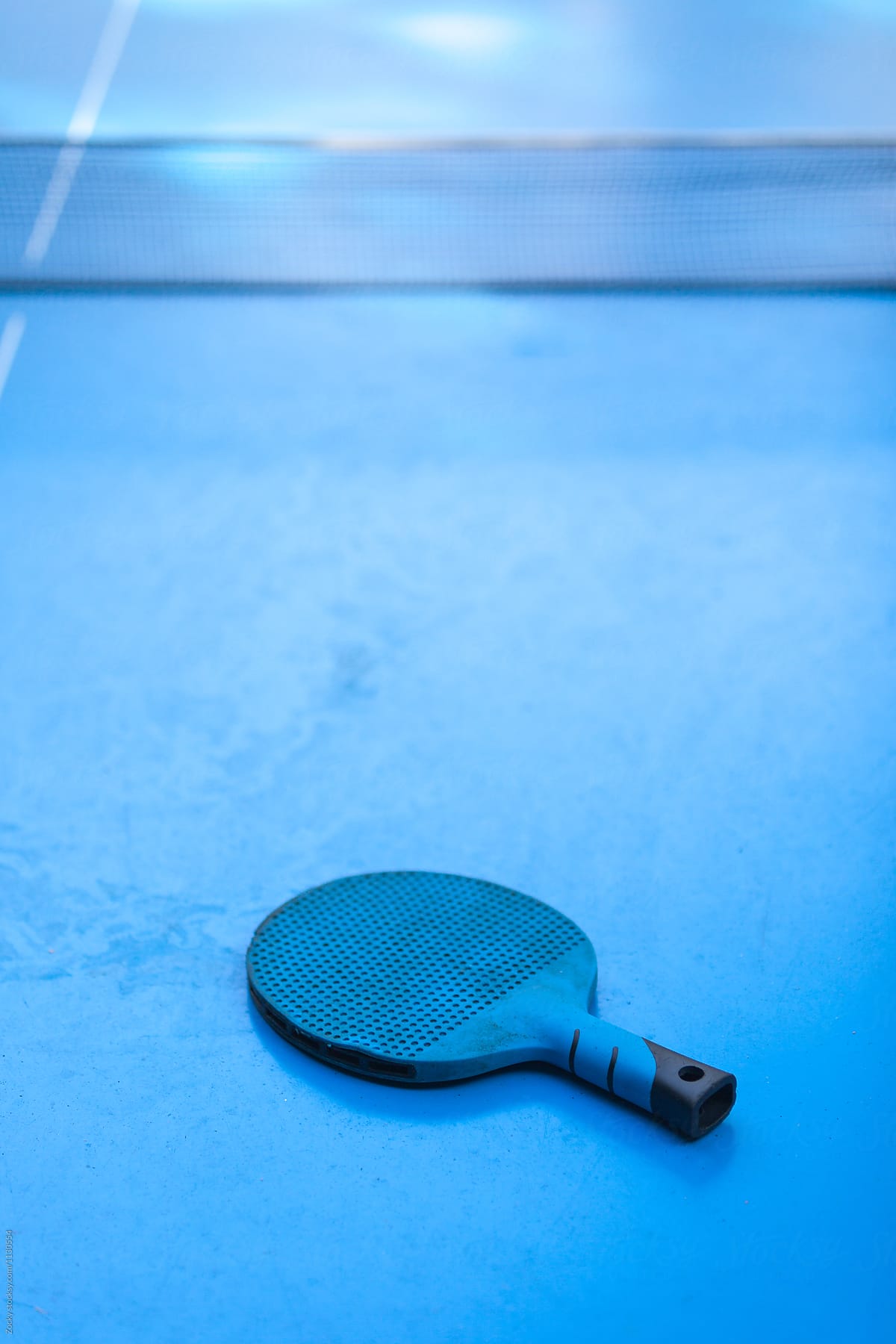 "Blue Table Tennis Setup" by Stocksy Contributor "Zoran Djekic" - Stocksy