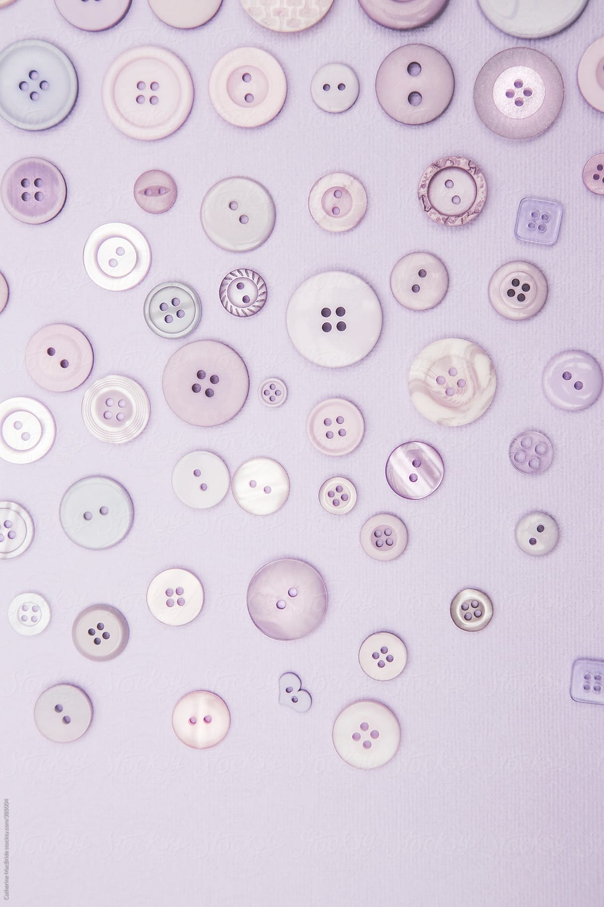 "Lilac Button Collection..." by Stocksy Contributor "Catherine MacBride ...