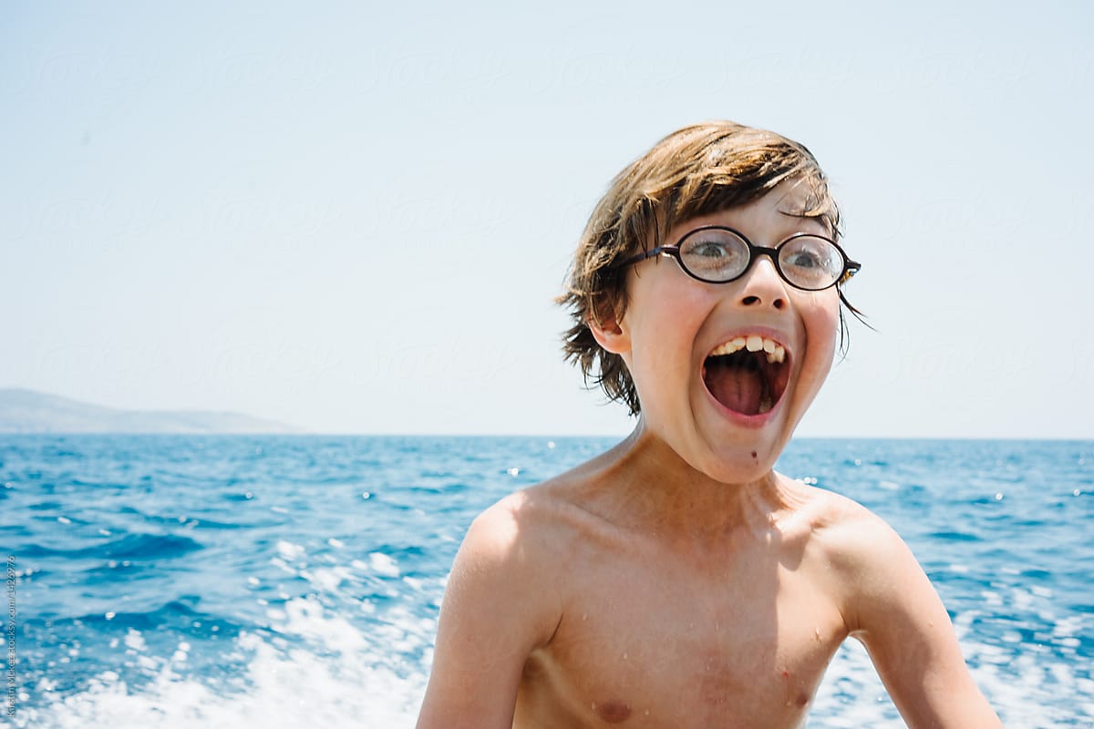 "Boy Screaming With Delight On The Back Of A Boat In Greece." by ...