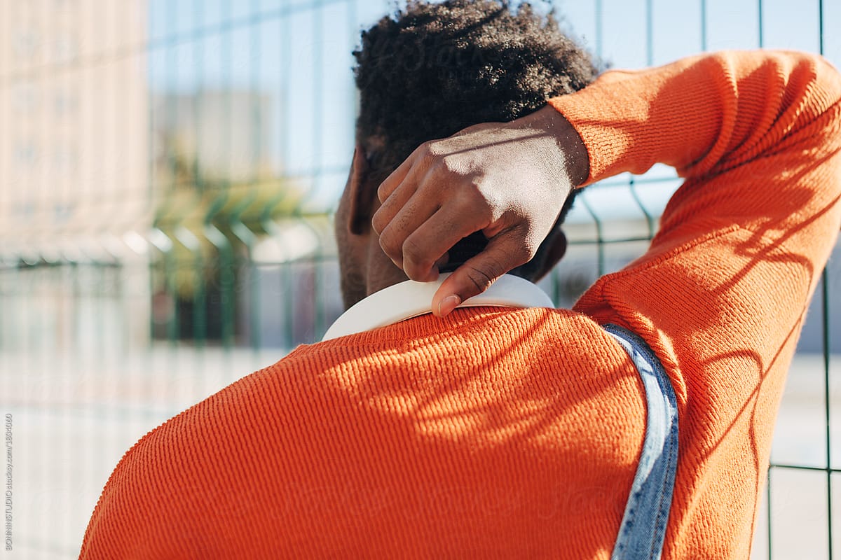 "Back View Of A Black Man Standing Outdoors." by Stocksy Contributor ...
