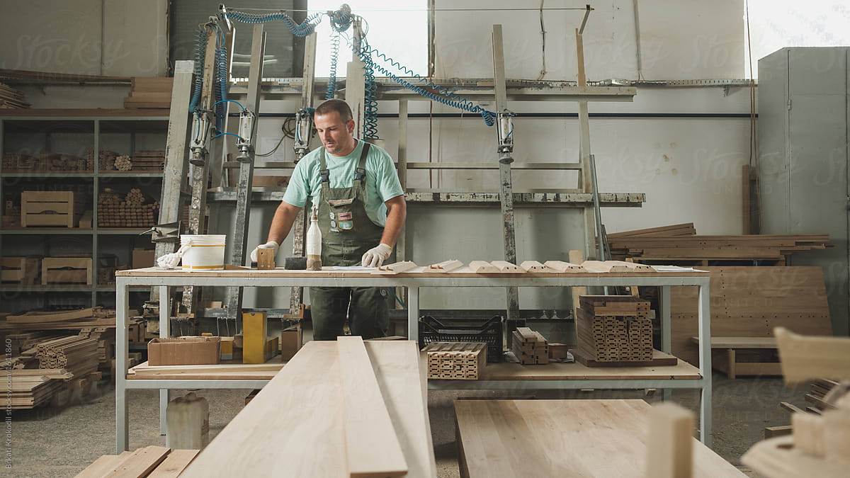 "Craftsman Working With Wood" by Stocksy Contributor "B Krokodil" - Stocksy