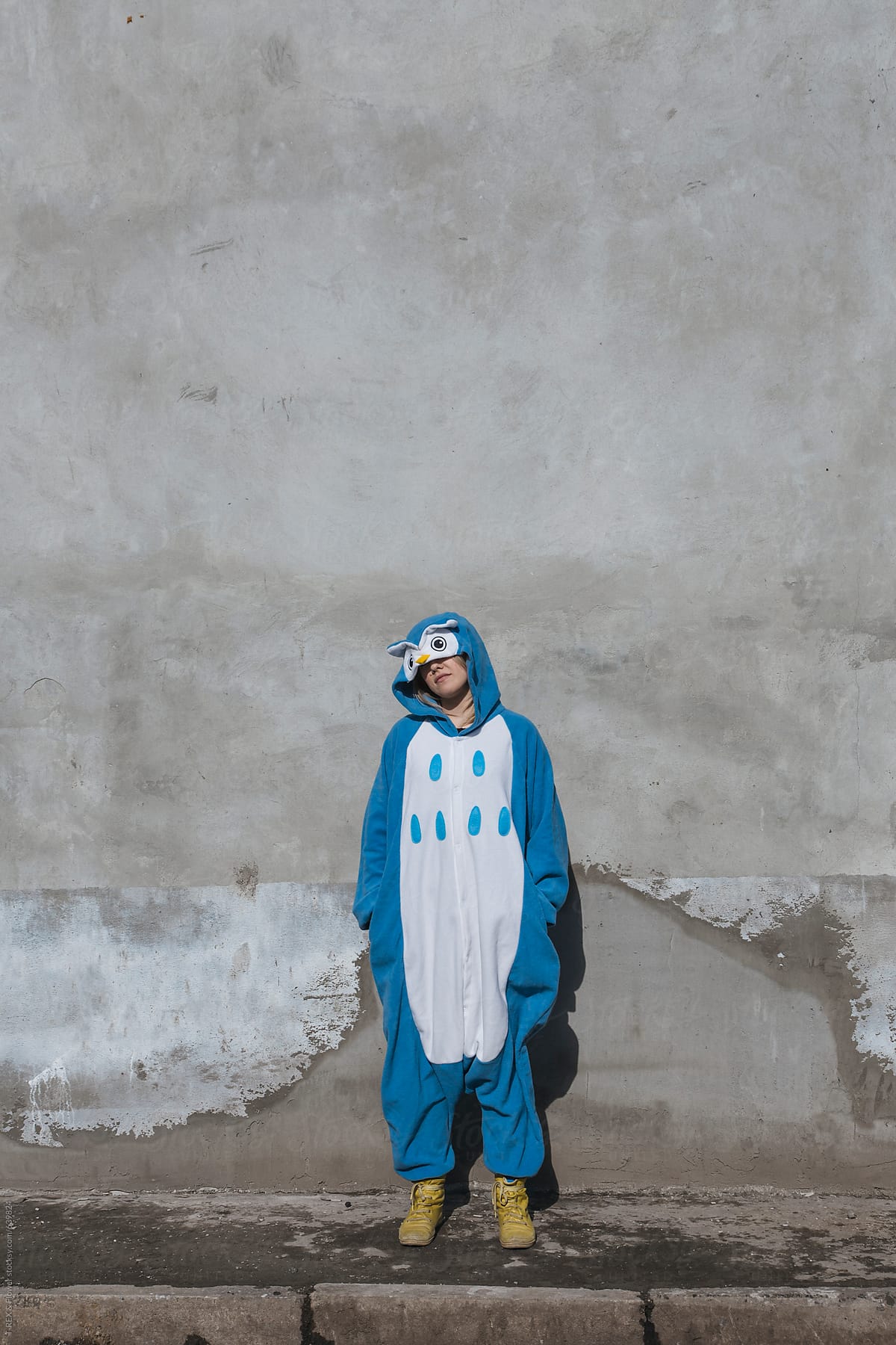 "A Girl Wearing Owl" by Stocksy Contributor "Danil Nevsky" - Stocksy