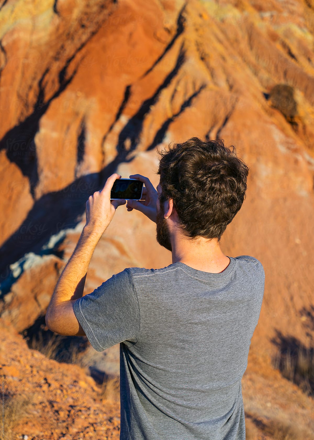 "Man Taking Photos" by Stocksy Contributor "Carles Rodrigo Monzo" - Stocksy