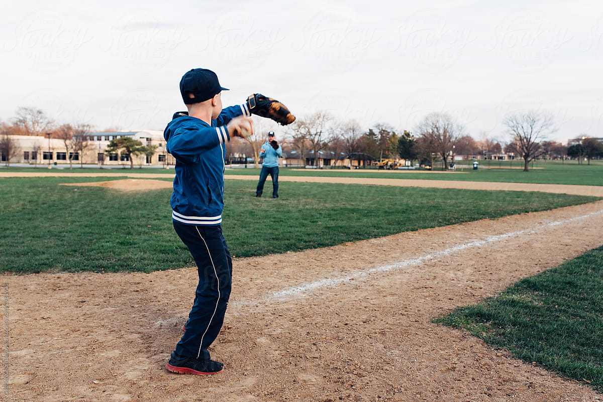 "Son Throwing A Ball To His Dad" by Stocksy Contributor "Gabi Bucataru ...