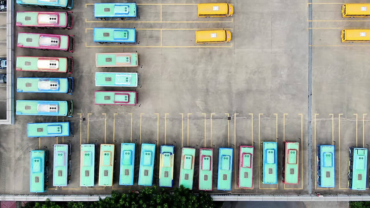 "Top-down Aerial View Into A Bus Depot" by Stocksy Contributor "ma yic ...