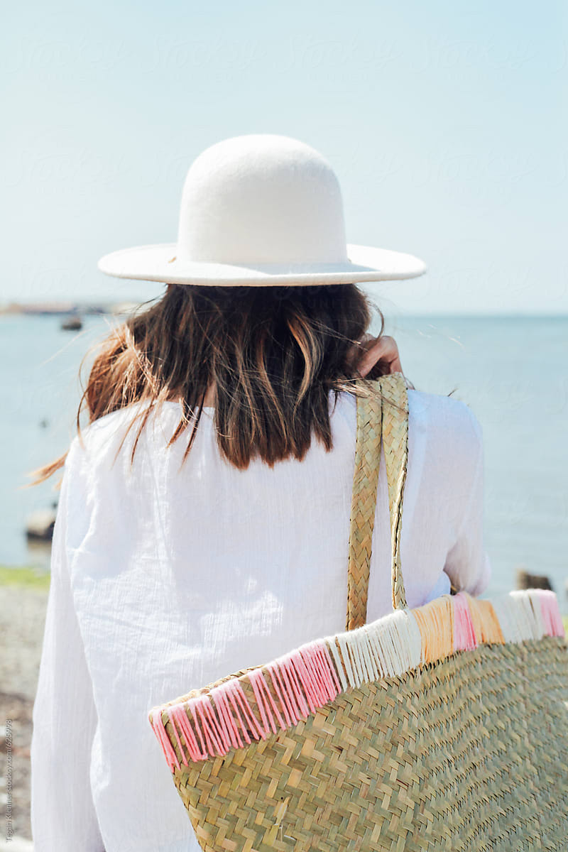 Woman Walking By The Ocean By Stocksy Contributor Pink House Woman Walking By The Ocean By Stocksy Contributor Pink House