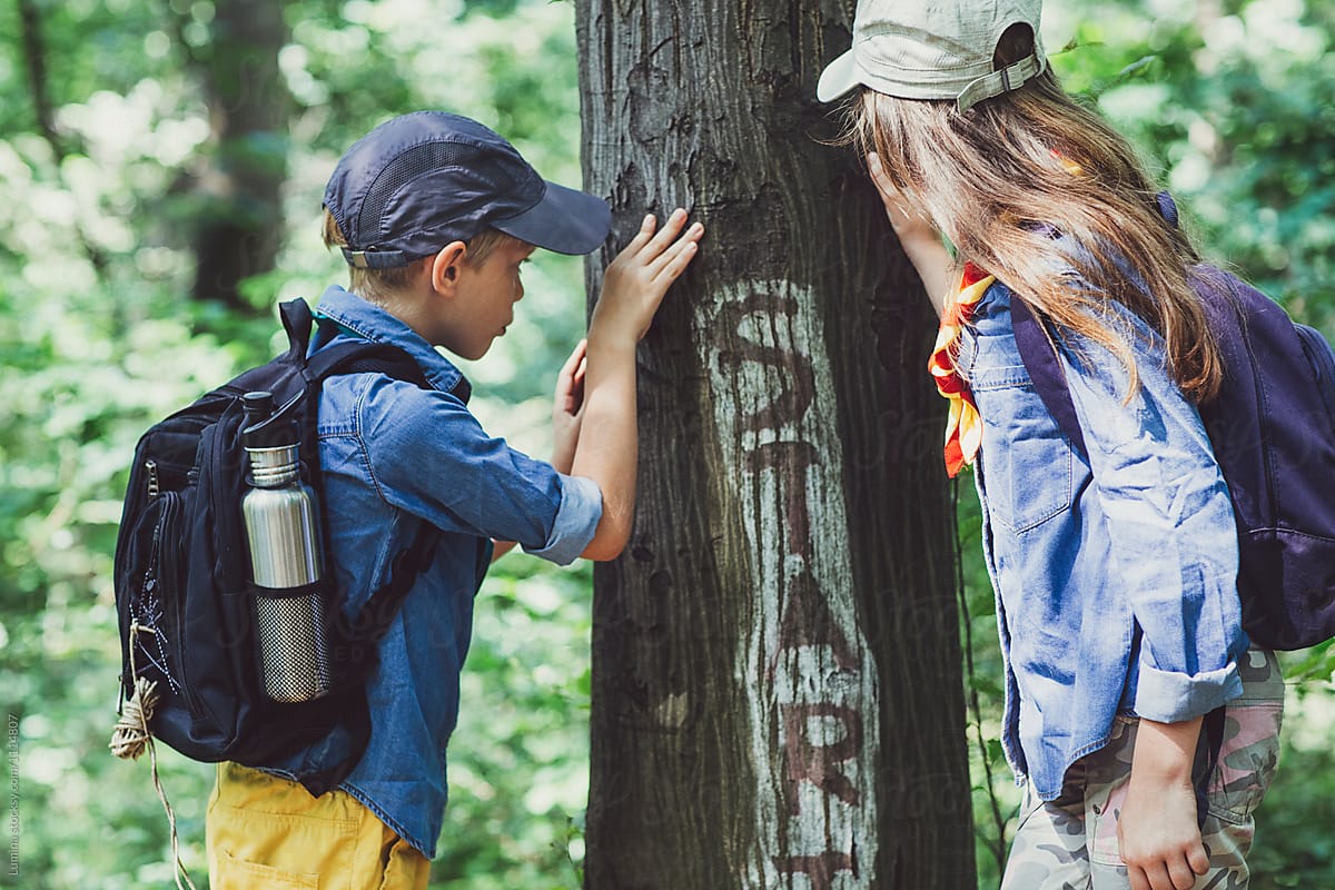 "A Boy And A Girl Exploring In The Woods" by Stocksy Contributor ...
