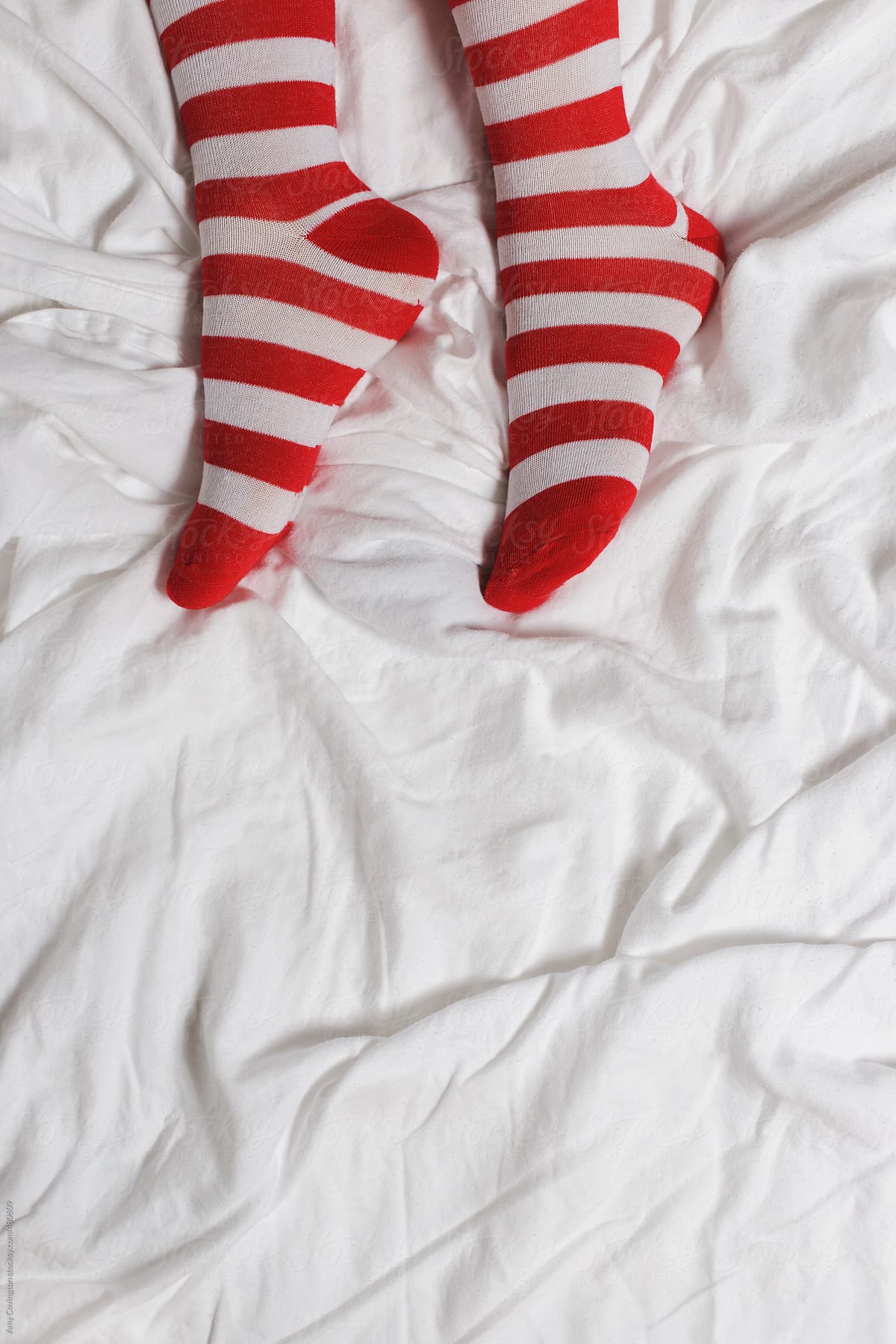 "Red And White Holiday Socks" by Stocksy Contributor "Amy Covington ...