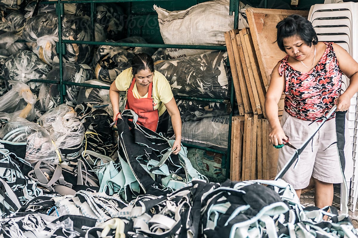 "Women Sorting Through Scrap Carseat Foam To Repurpose As Doormat" by ...