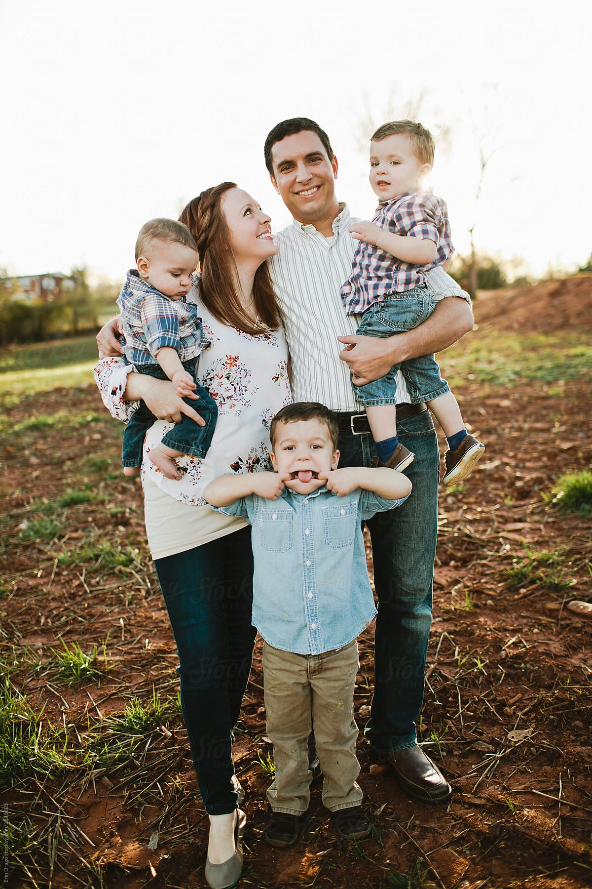 "Happy All-boy Family Outside" by Stocksy Contributor "Erin Drago ...