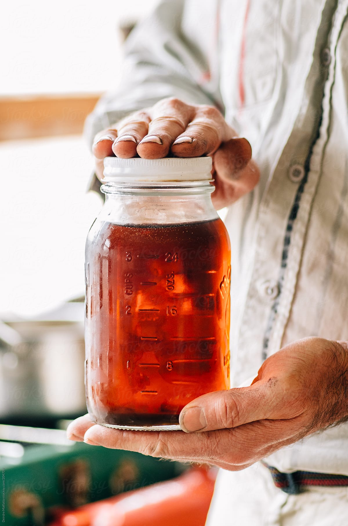 "Man Shows Off Jar Of His Homemade Maple Syrup" by Stocksy Contributor ...