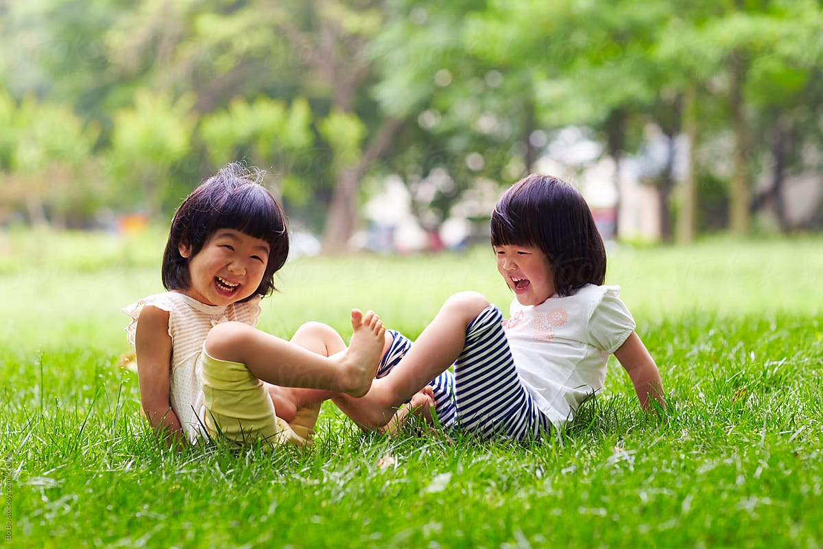 "Little Friends Together" by Stocksy Contributor "Bo Bo" - Stocksy