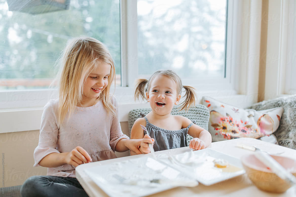 "Kids Eating Together At Table For Breakfast" by Stocksy Contributor ...