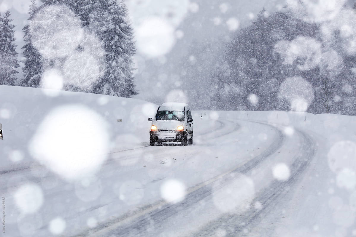 "Car Snow Traffic Snowfall Car" by Stocksy Contributor "Rolfo" - Stocksy