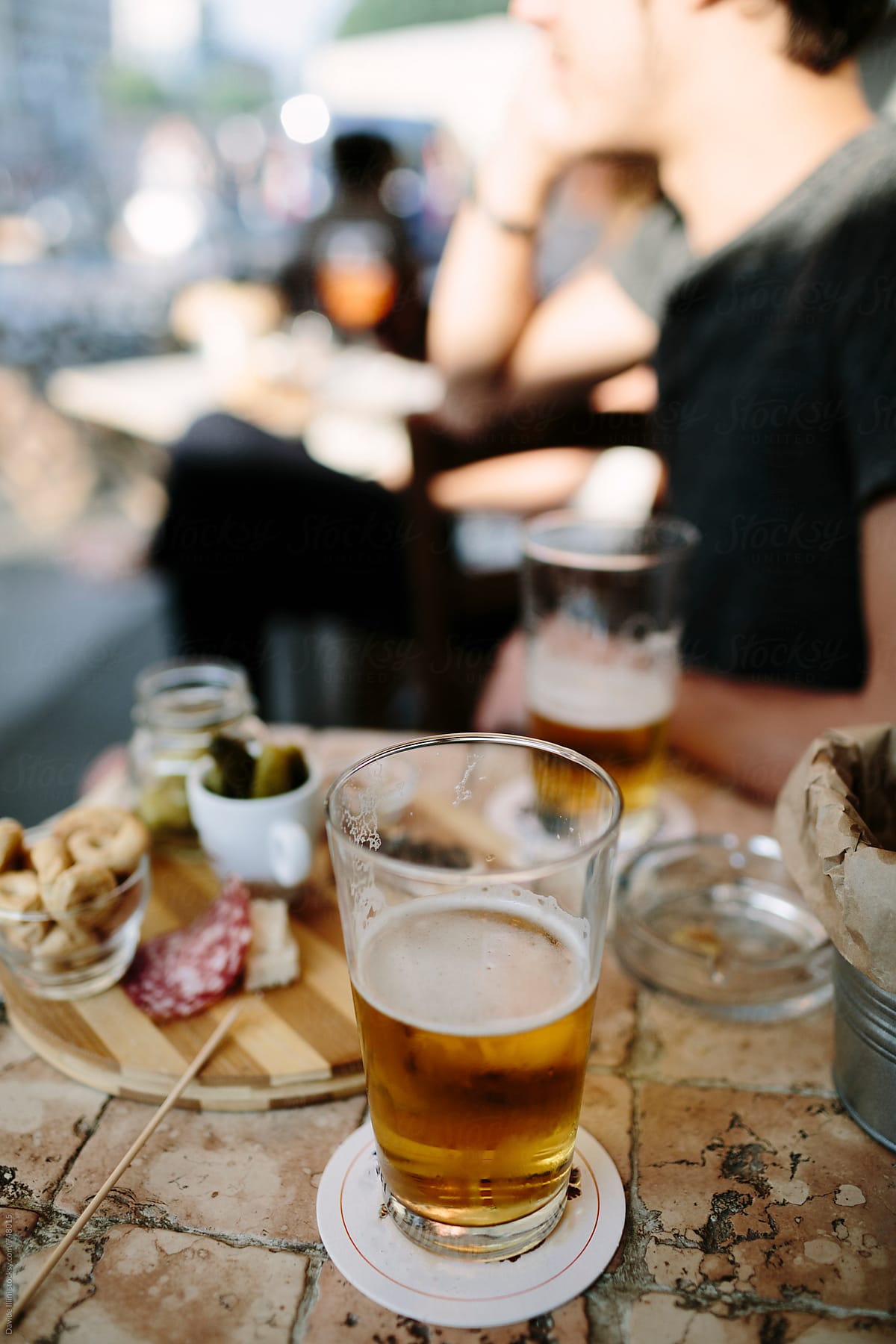 "Beer On A Table In A Cafe" by Stocksy Contributor "Davide Illini ...