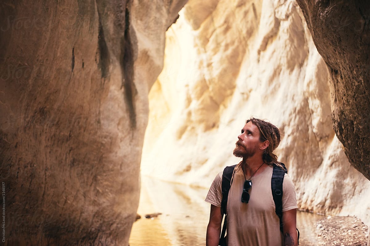 "Nomad Man Wandering Through A Gorge, Enjoying The View" by Stocksy ...