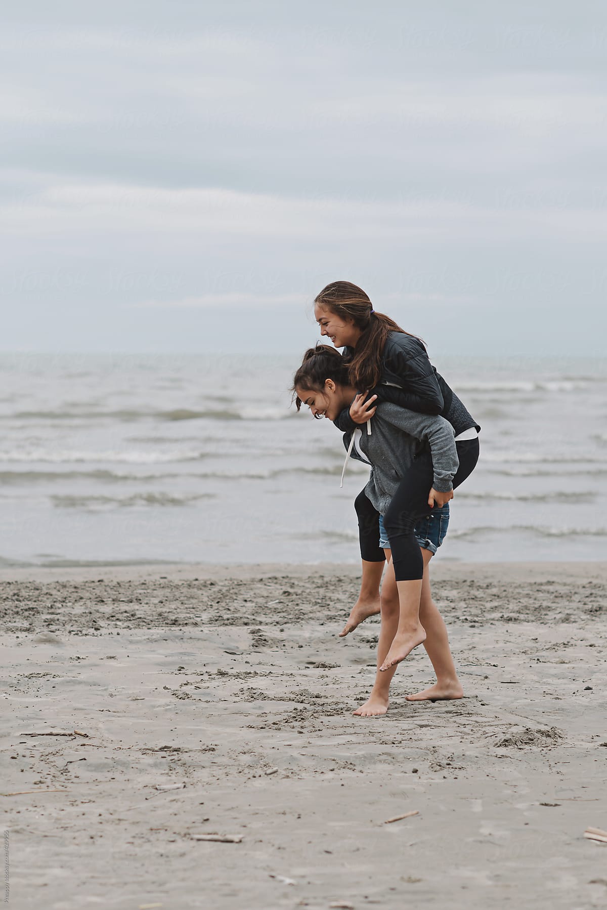 "Teenage Girl Give Piggy Back To Best Friend" by Stocksy Contributor ...