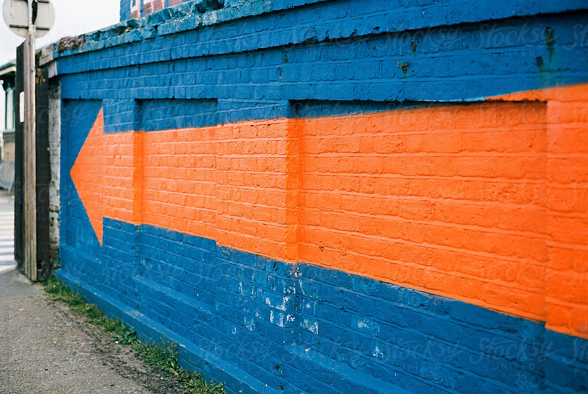"Painted Arrow" by Stocksy Contributor "Sam Burton" - Stocksy